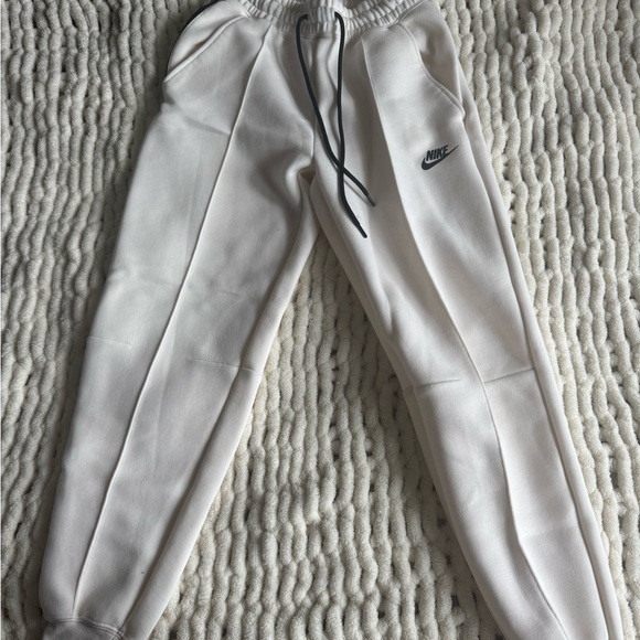 Nike | Pants & Jumpsuits | Nike White Sweatpants With Tapered Legs ...